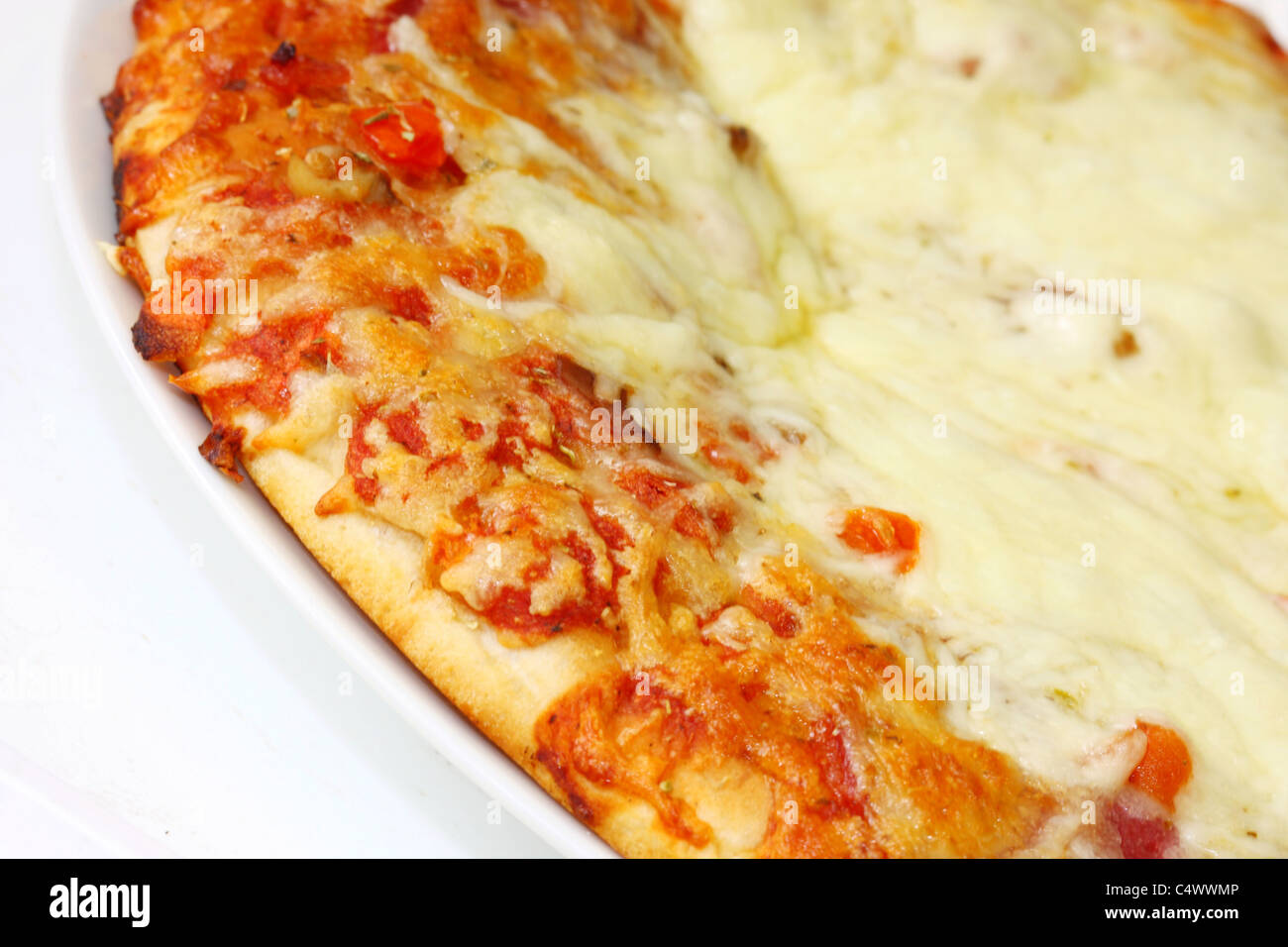 Closeup of cheese pizza Stock Photo - Alamy
