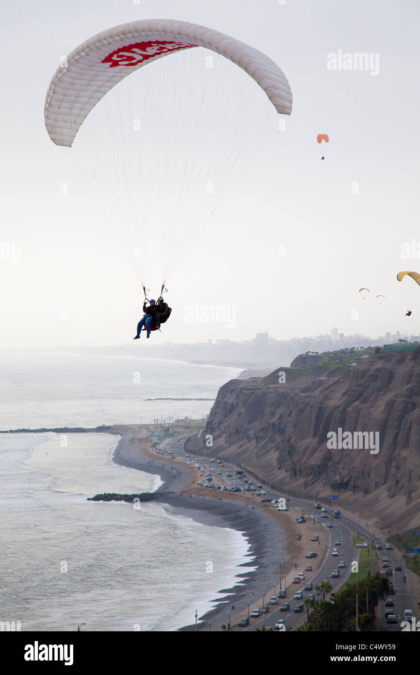 Tandem Paragliding over the coastline in Miraflores, Lima, Peru Stock ...