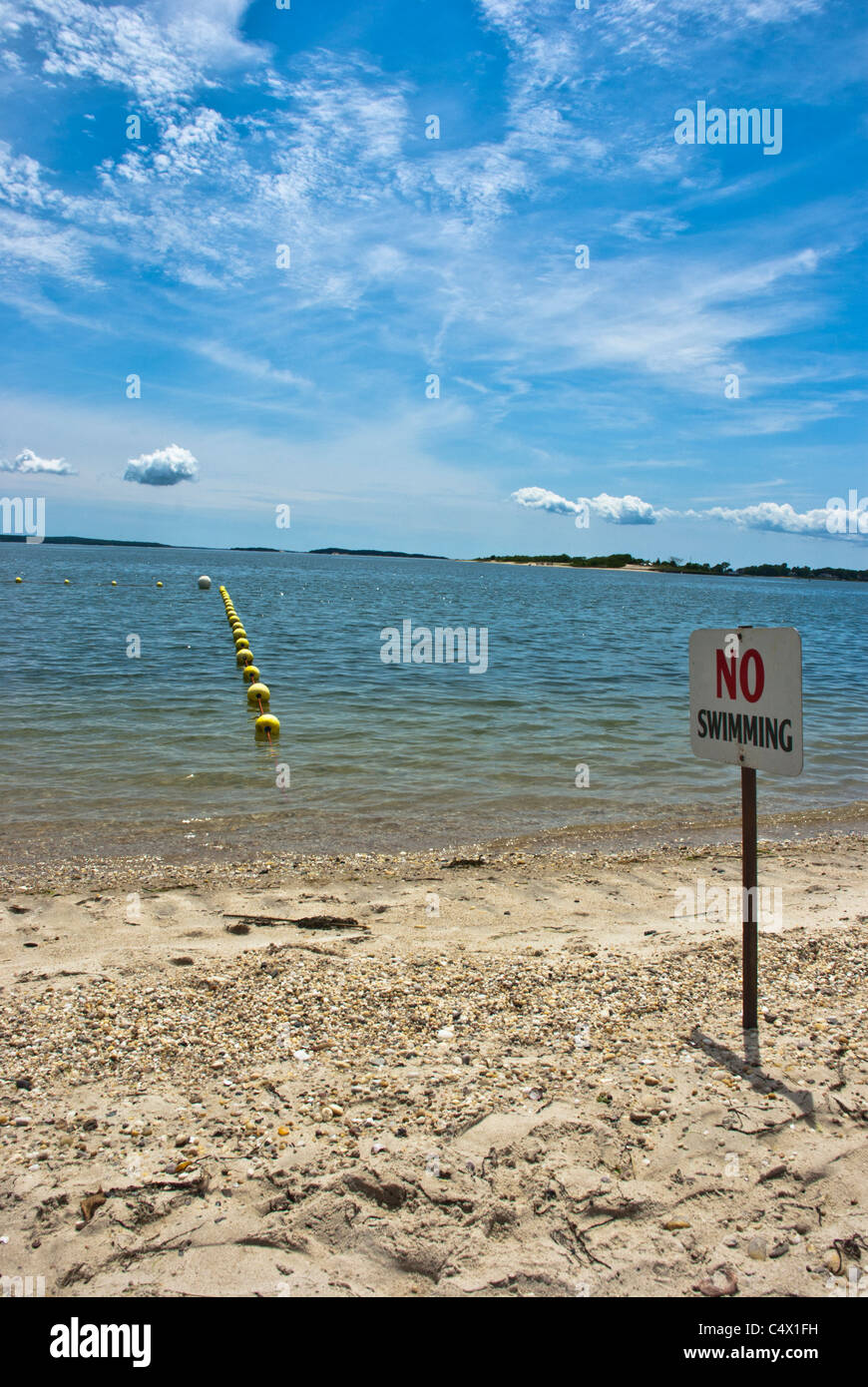 No Swimming Sign at Beach in Shelter Island Stock Photo - Alamy