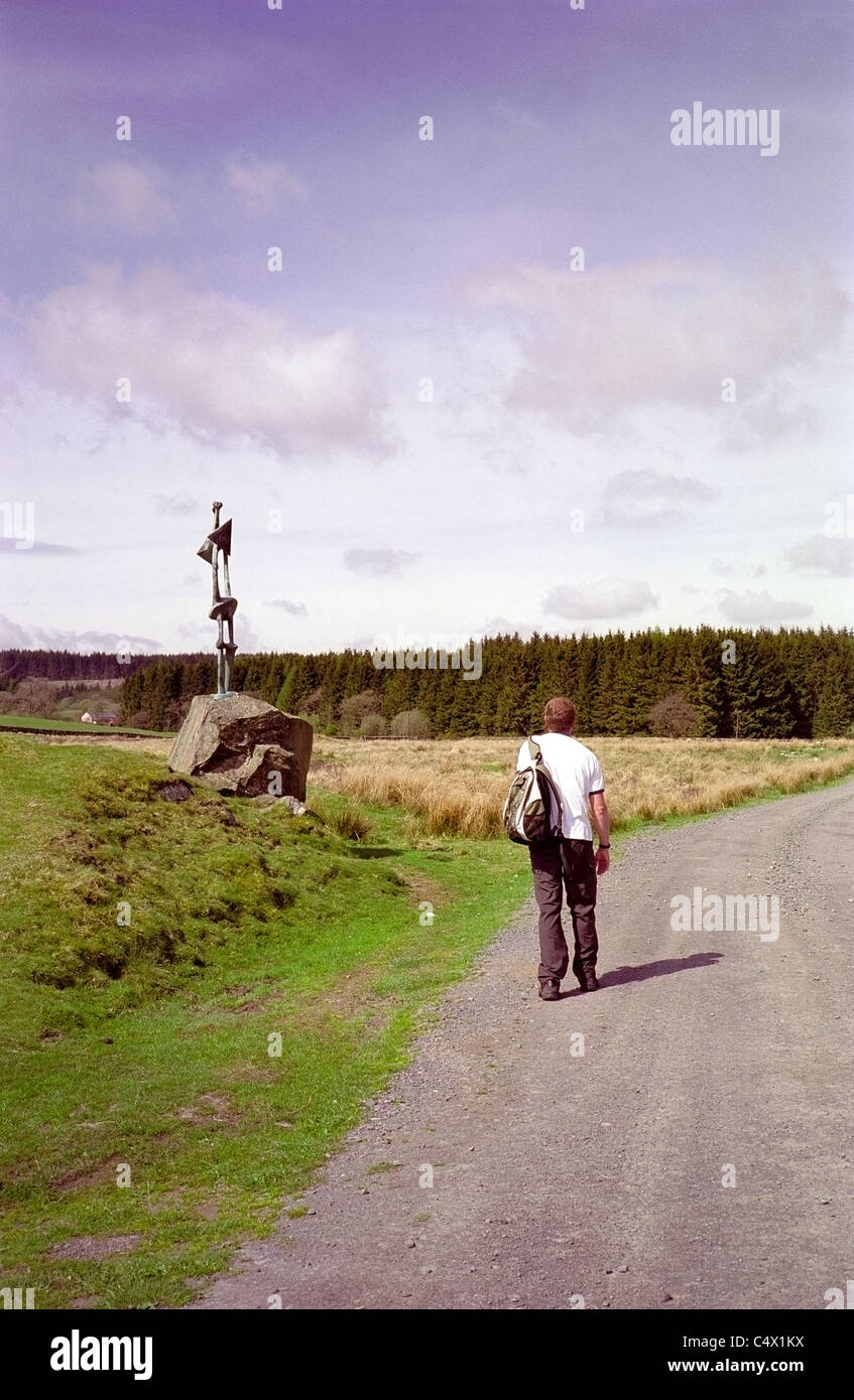 Rambler Walking Along Road at Glenkiln with Standing Figure Sculpture ...