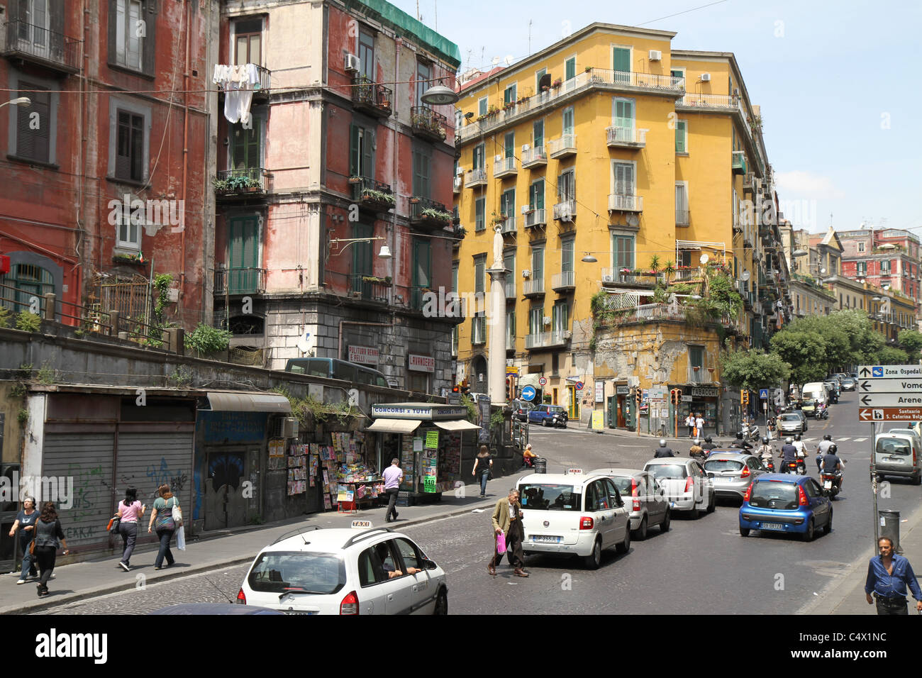 Traffic in Naples, Italy, in front of historic buildings Stock Photo ...