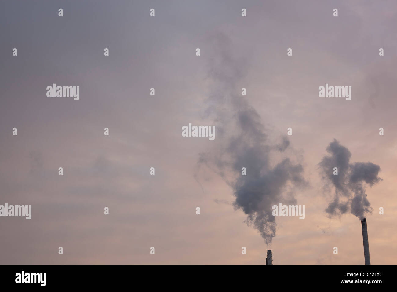 Smoke coming from factory Stock Photo - Alamy