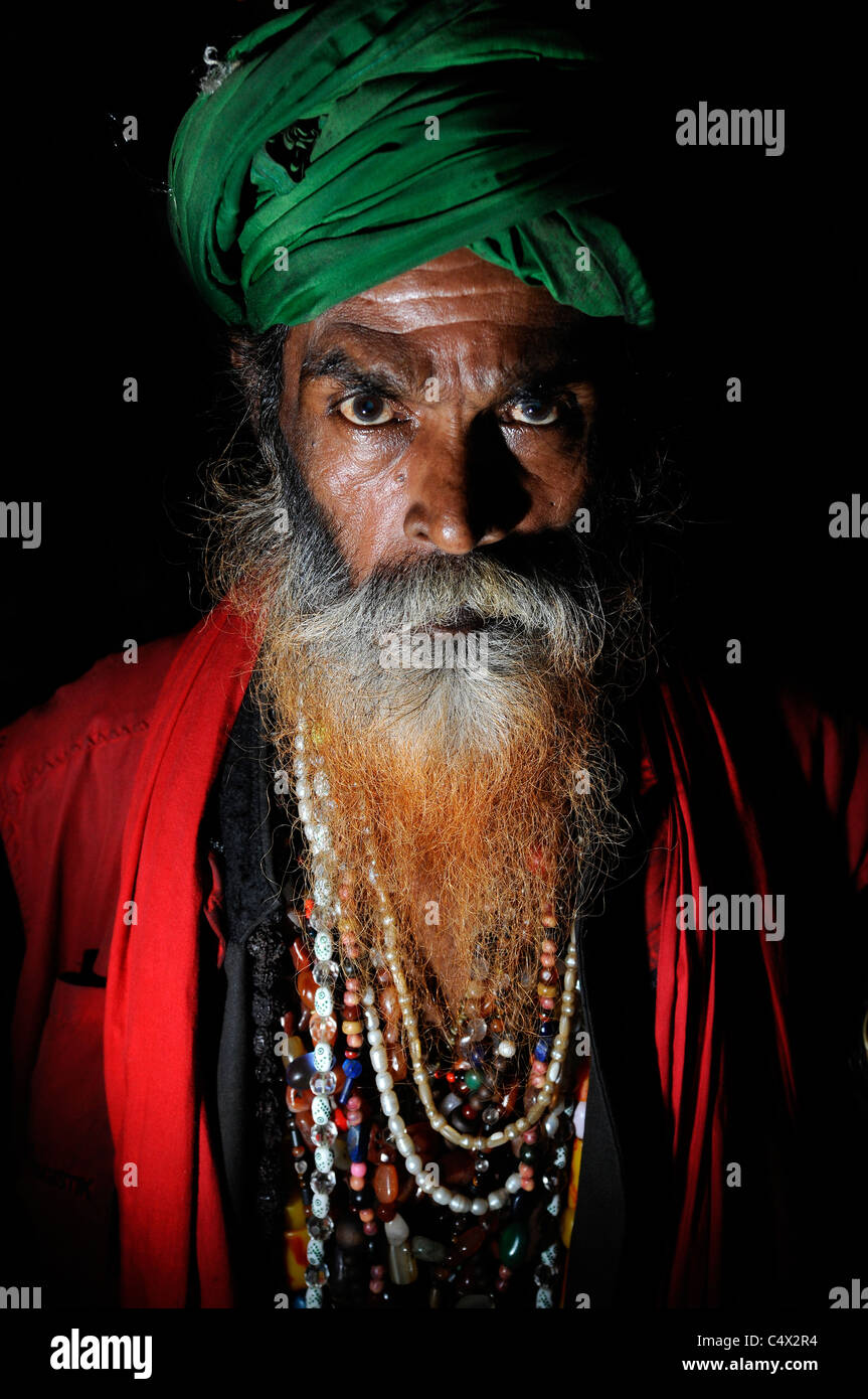 A Sufi fakir (holy man) at the Shah Ali shrine in Dhaka, Bangladesh ...
