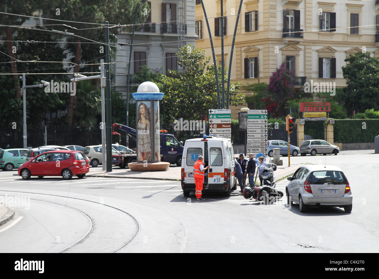 Traffic accident between car and motorbike in Naples, Italy Stock Photo ...