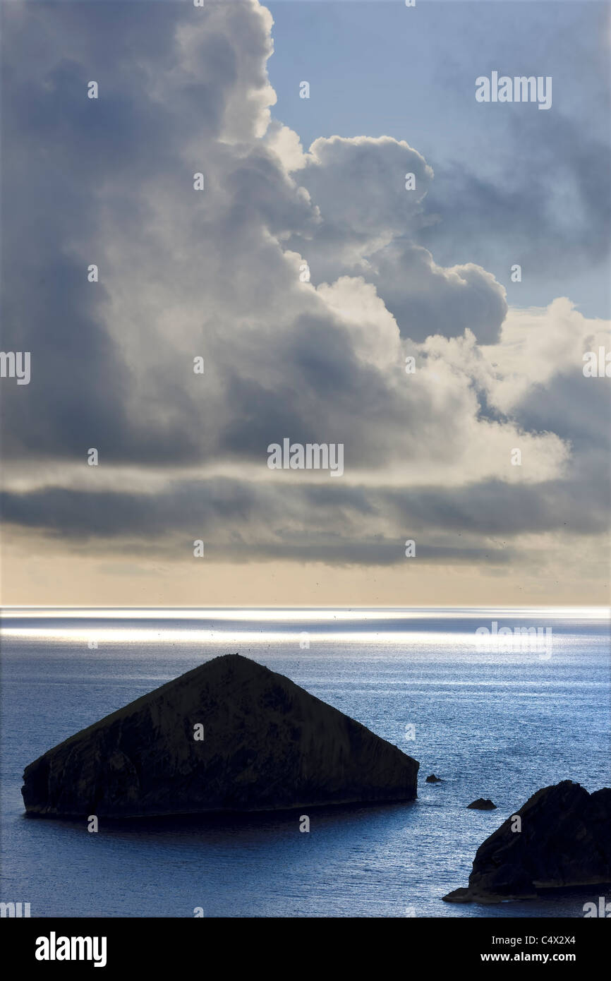 Sunset taken from cliffs over Ilheu Mosteiros on Sao Miguel island in ...
