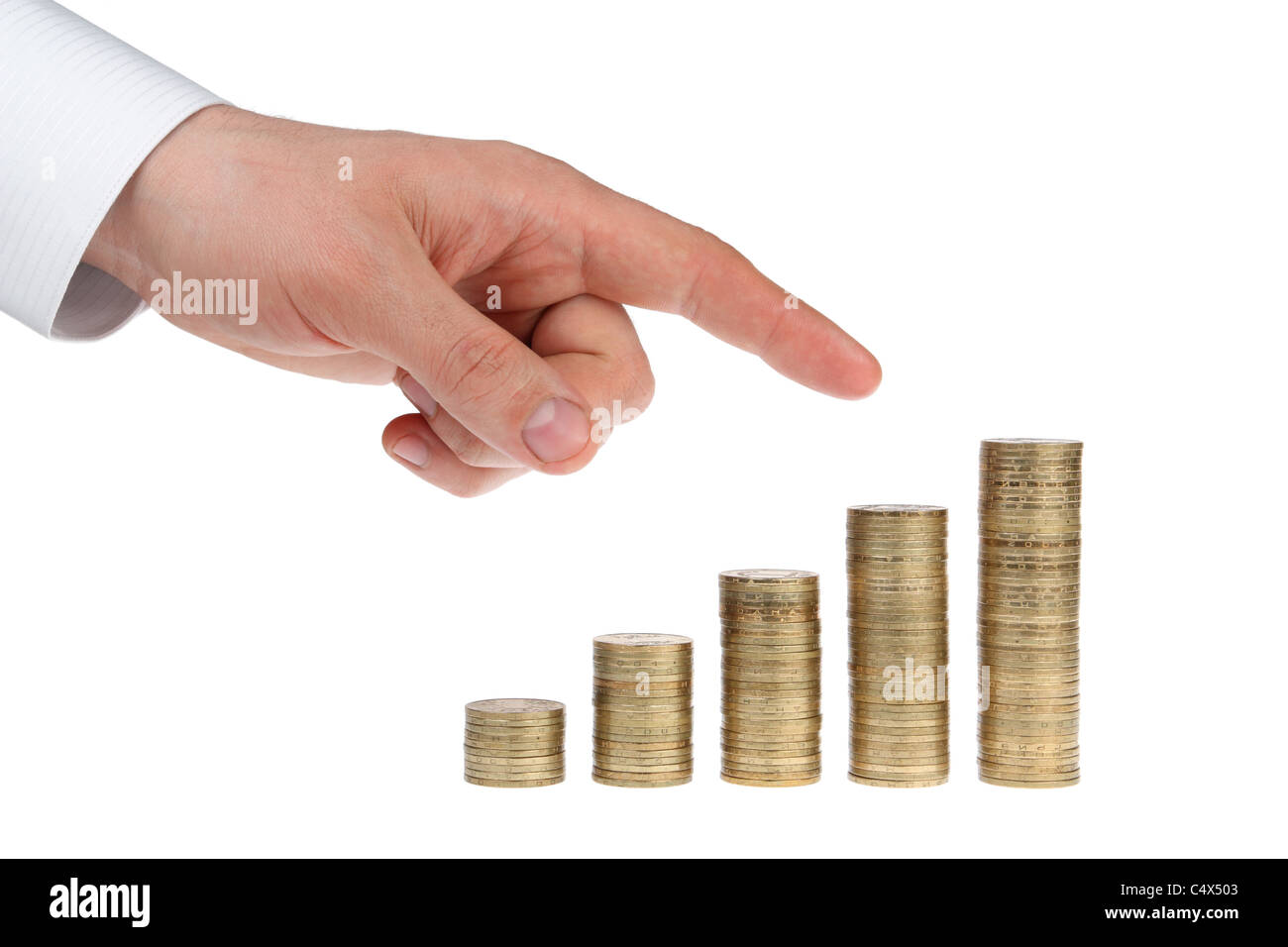 Hand pointing to the pile of coins on white background Stock Photo - Alamy