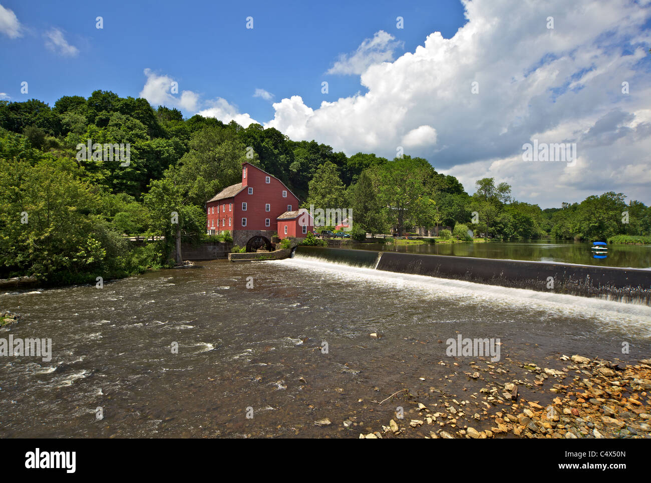 Faded Red Water Mill on the Dam of the Raritan River Stock Photo - Alamy