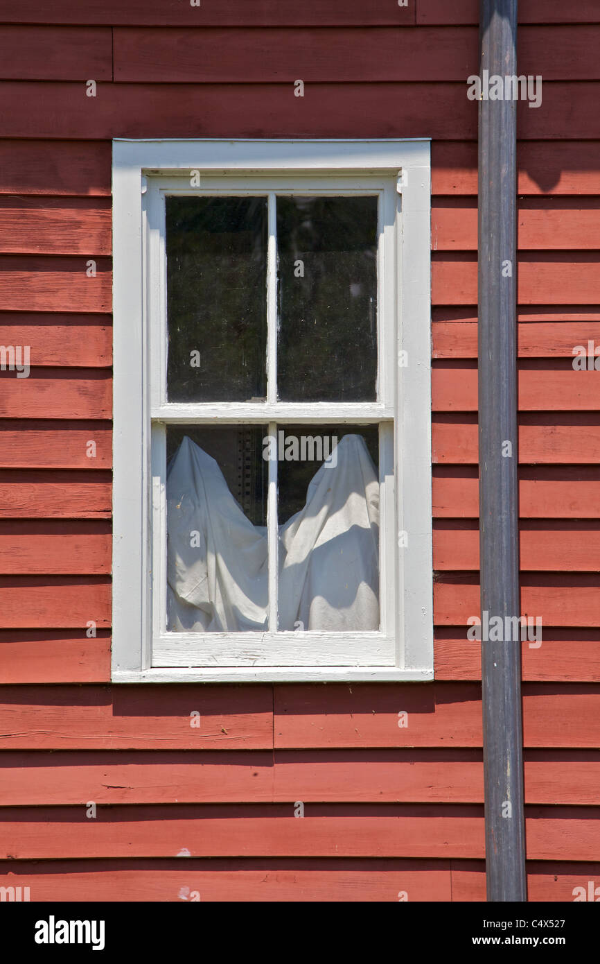 White Wood Window against a Faded Weathered Red Barn Wall Stock Photo ...