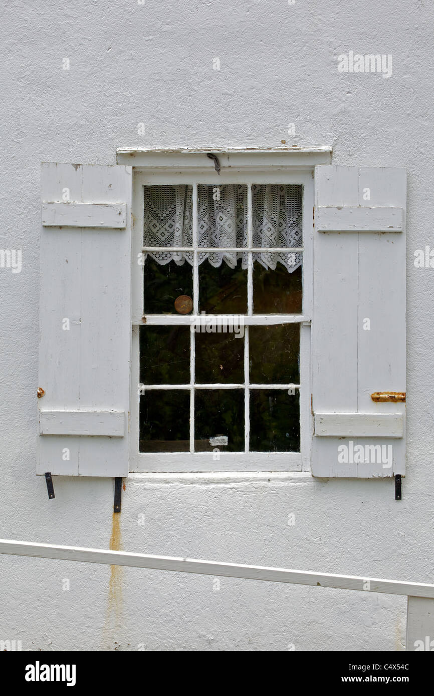 White Wood Window against a White Plaster Wall Stock Photo - Alamy