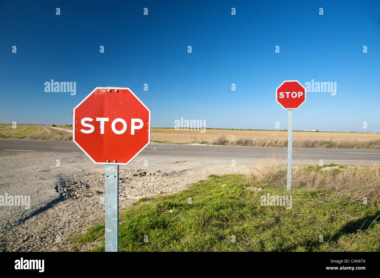 stop traffic sign next to road in valladolid spain Stock Photo - Alamy