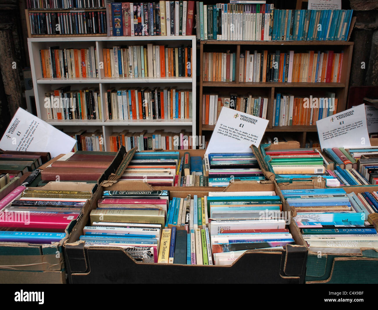 Second hand books for sale on a charity stall Stock Photo - Alamy