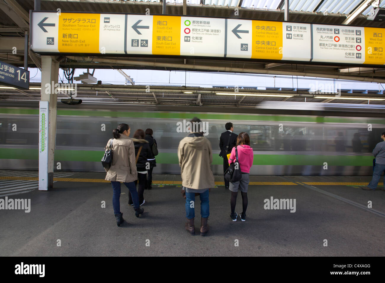 Tokyo Metro Station Platform with Commuters Stock Photo - Alamy