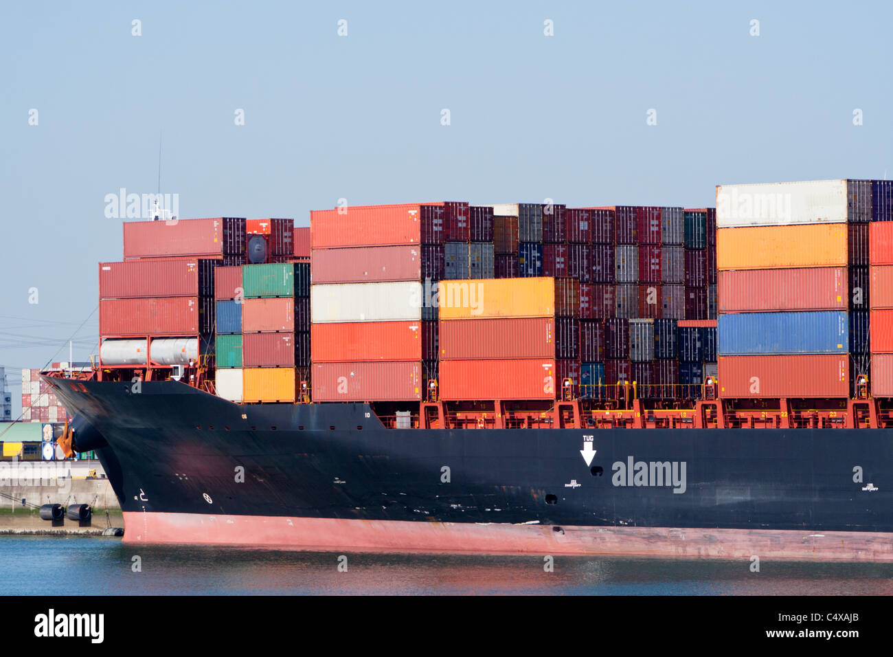 container ship in the harbor Stock Photo - Alamy