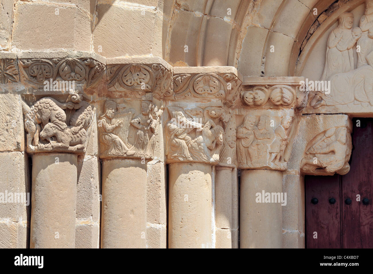 Romanesque portal of Santiago church (12th century), Aguero, province ...