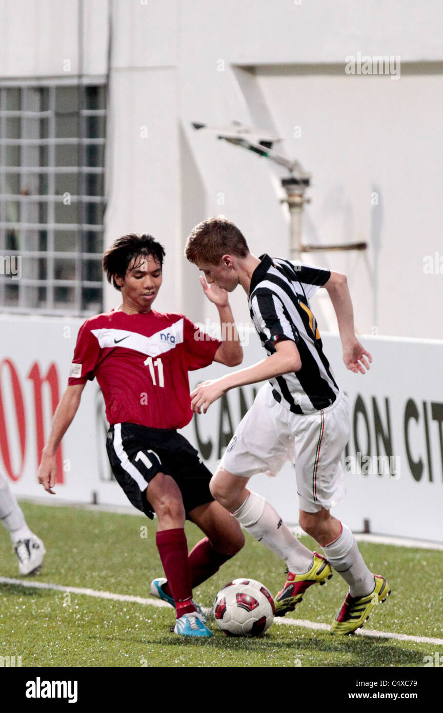 Rinaldi Federico of Juventus FC U15(right) and Azhar Ramli battle for ...