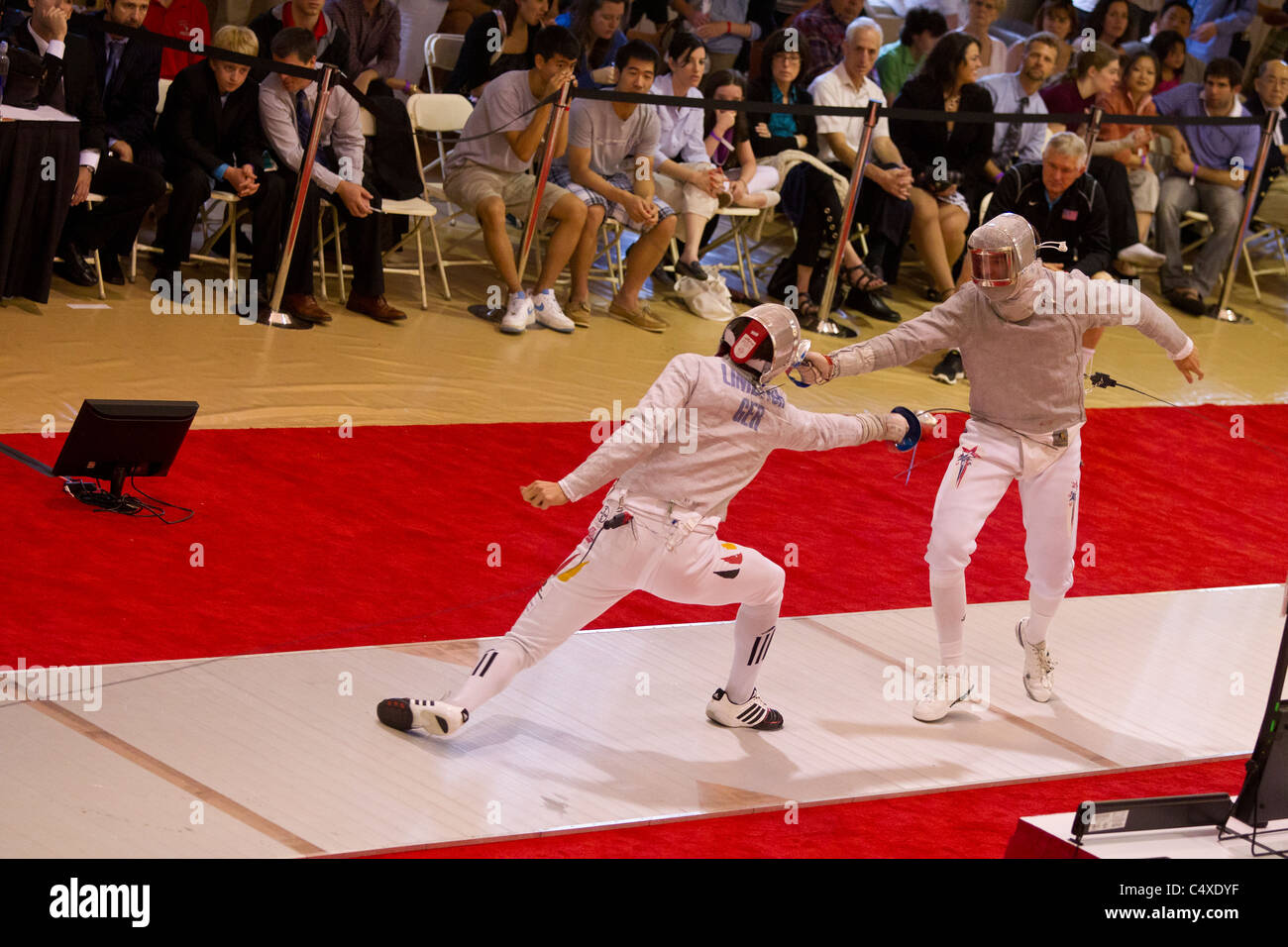 Nicolas Limbach (GER) competing against Avery Zuck (USA) at the 2011 ...