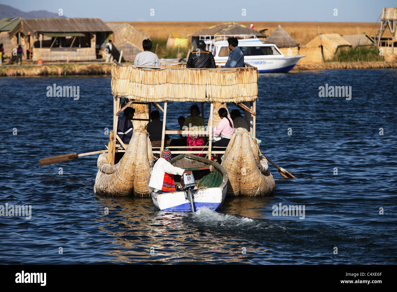 A boat made from torta or reeds on the floating islands of Uros on Lake ...