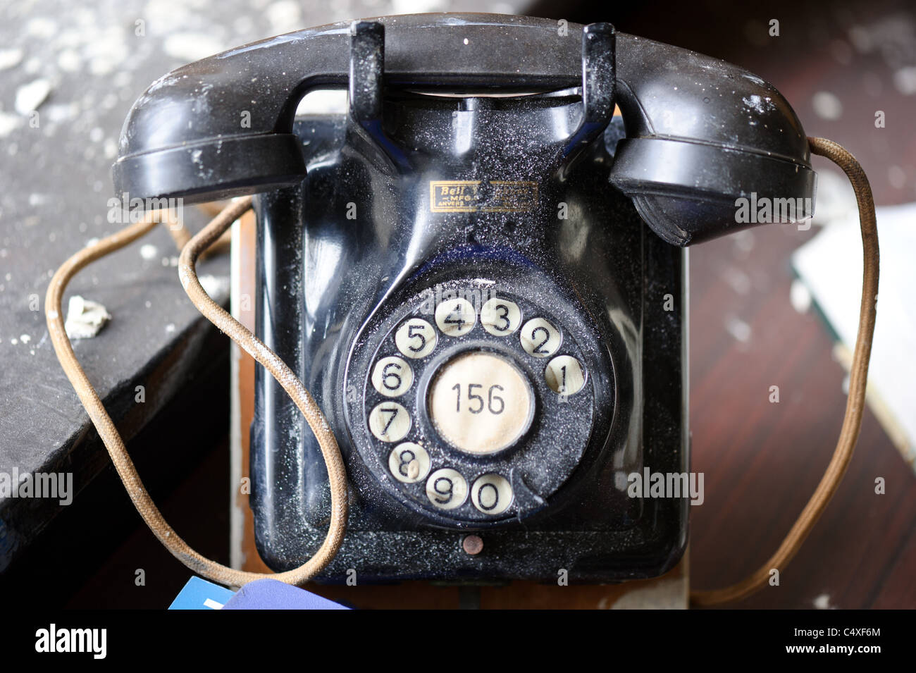 old analog black telephone with dial wheel Stock Photo - Alamy