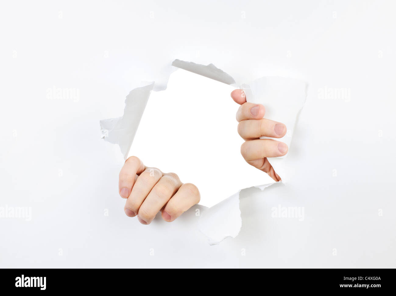 Ripping paper hi-res stock photography and images - Alamy