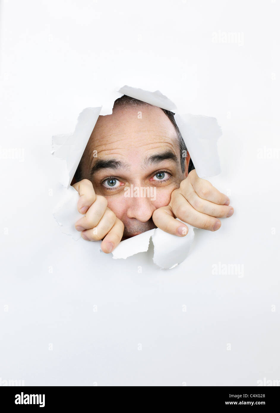 Man ripping paper hi-res stock photography and images - Alamy