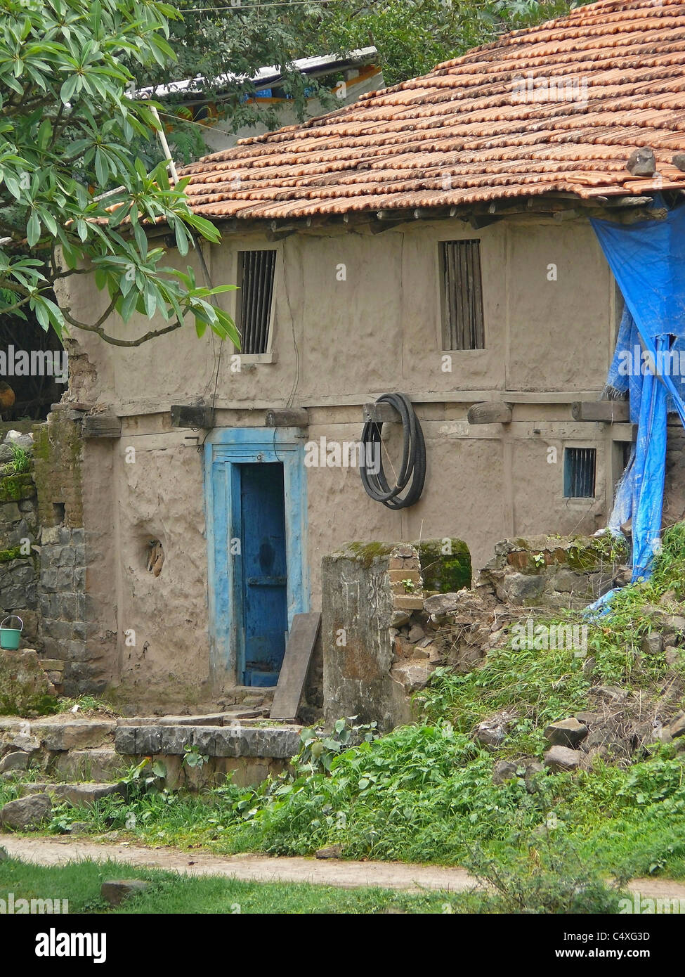 Traditional rural house in a village Stock Photo - Alamy