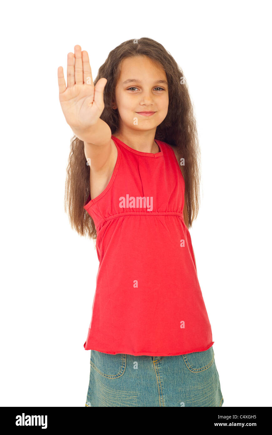 Smiling girl showing stop hand isolated on white background Stock Photo ...