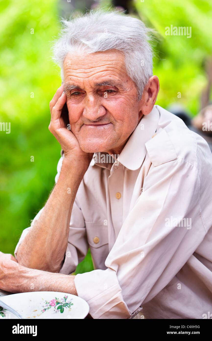Closeup portrait of an old man outdoor, smiling Stock Photo - Alamy