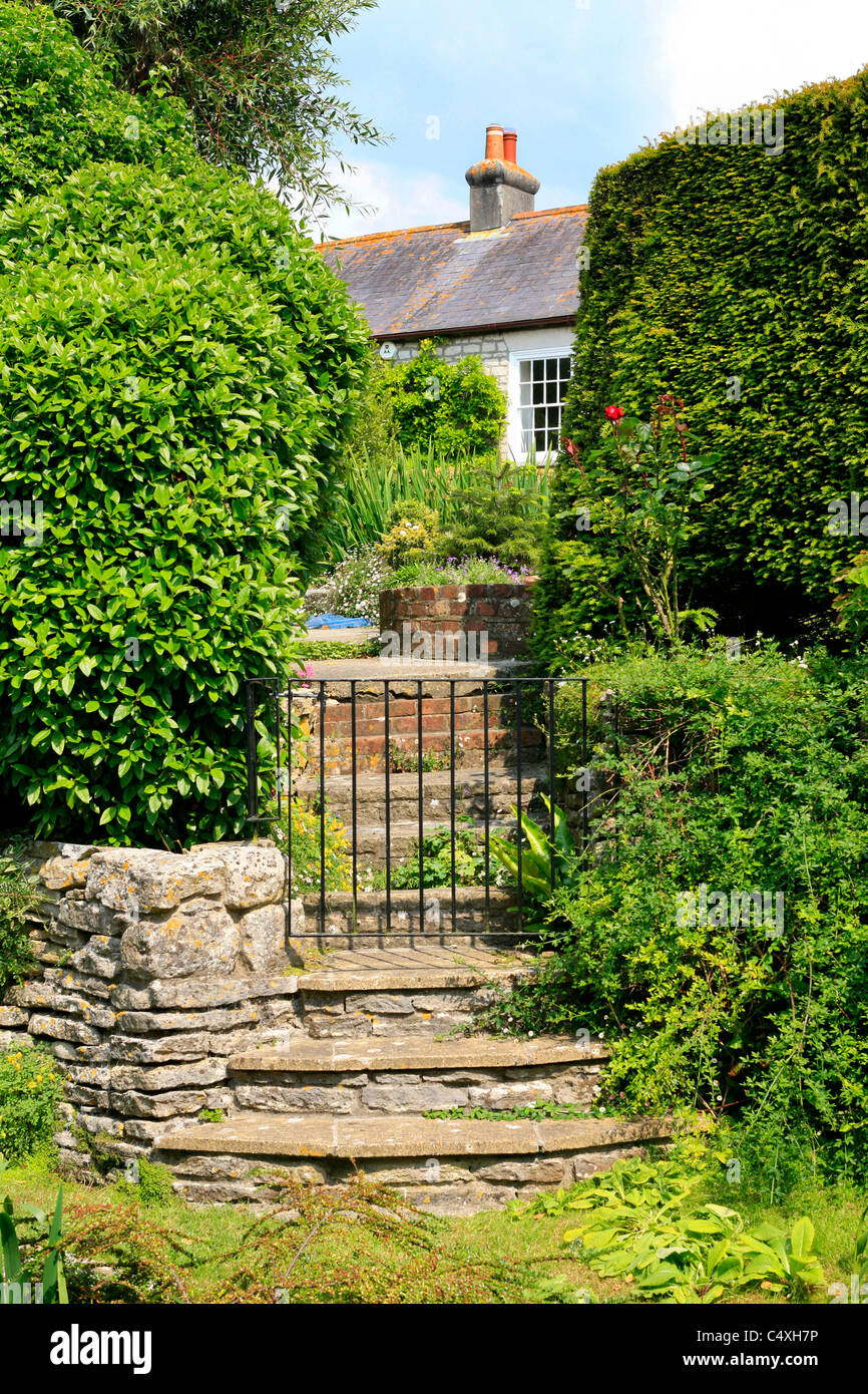 Gateway leading to a cottage garden in Sutton Poyntz, Dorset UK Stock ...