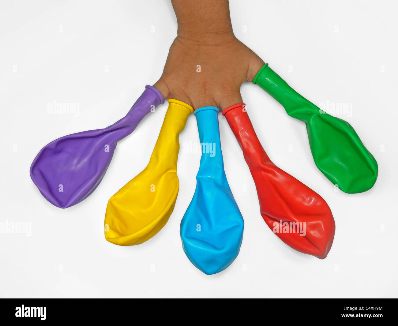 Colorful Balloons in human hand Stock Photo - Alamy