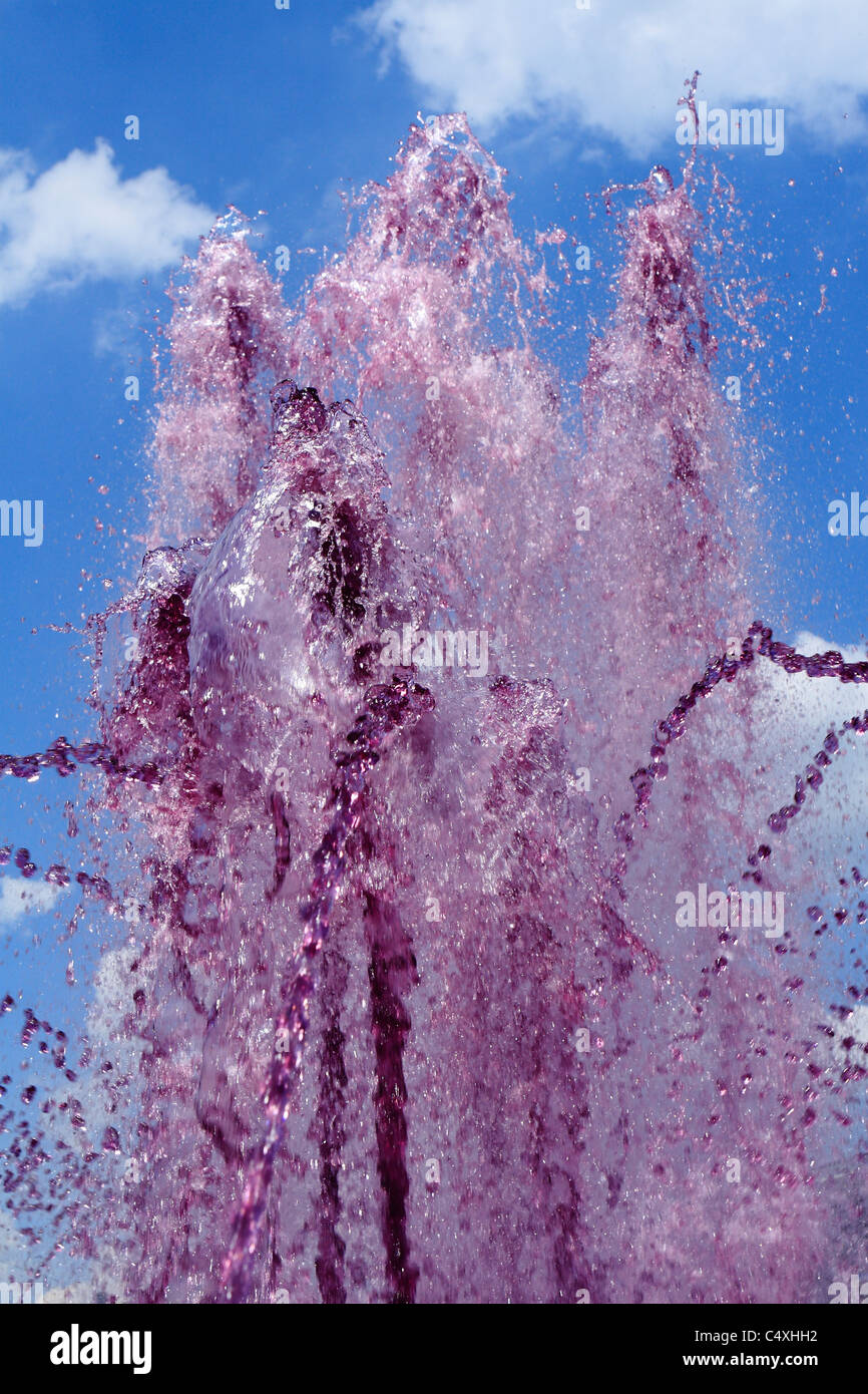 The fountain with violet water Stock Photo - Alamy