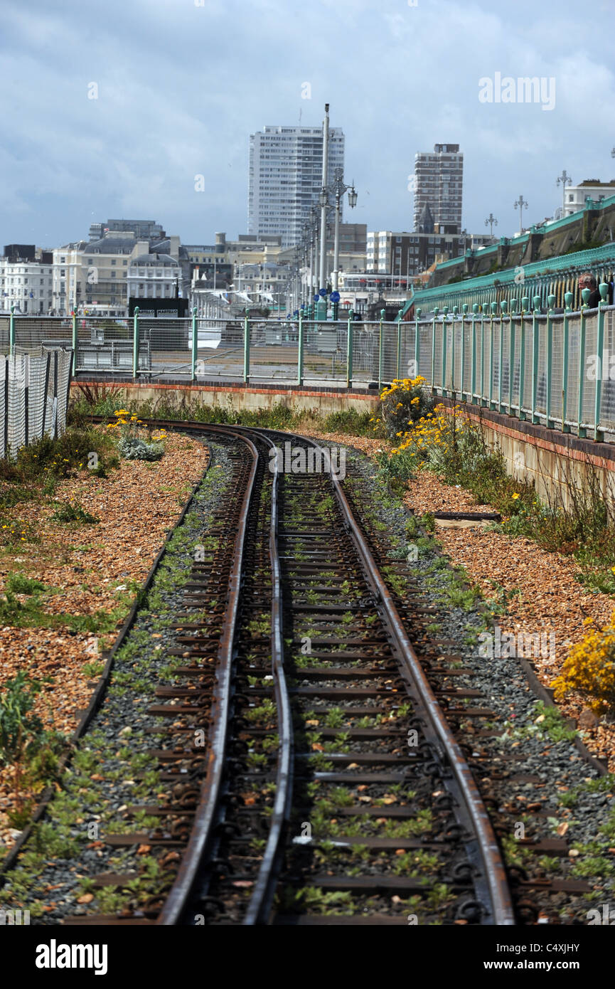 Empty rail tracks for the Volks Railway running along Brighton seafront ...