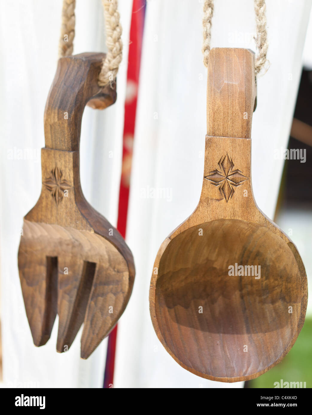Ornamental wooden spoon and fork at Horezu traditional earthenware in ...