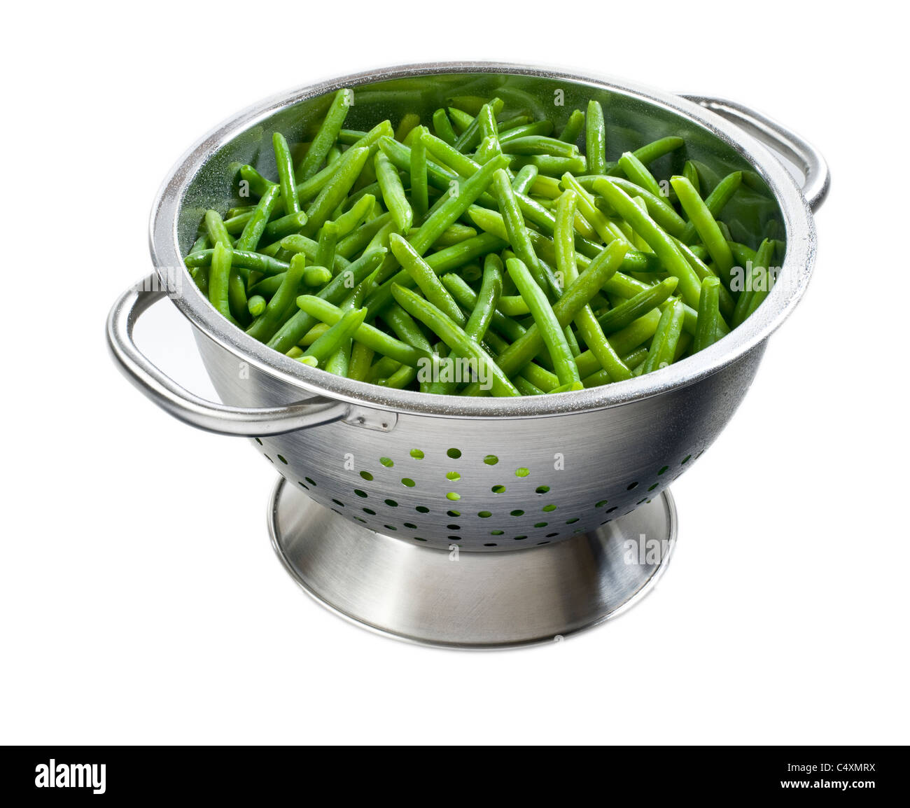 Steel Colander with vegetables on white background Stock Photo - Alamy