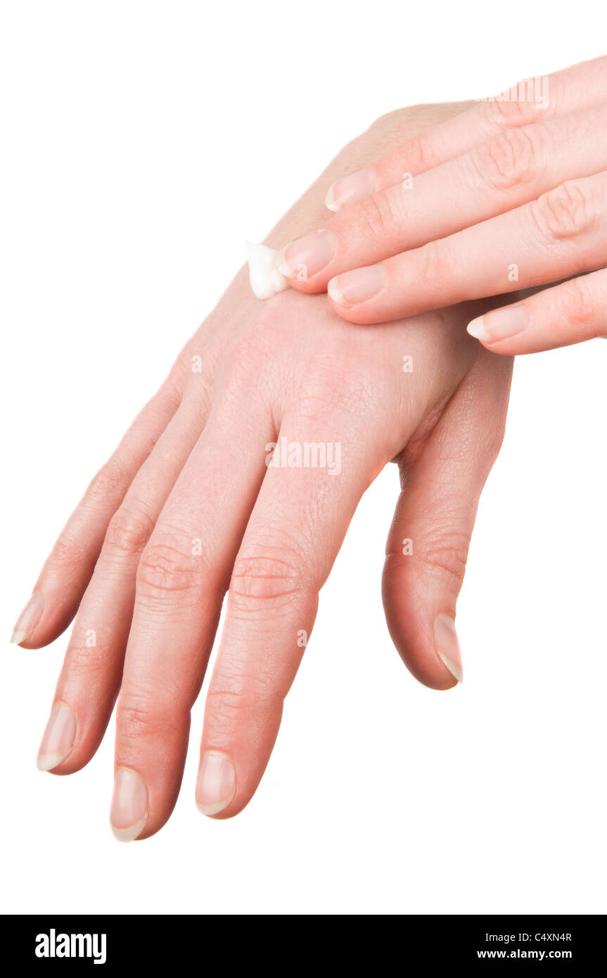 Woman putting cream on her hands, isolated on white Stock Photo - Alamy