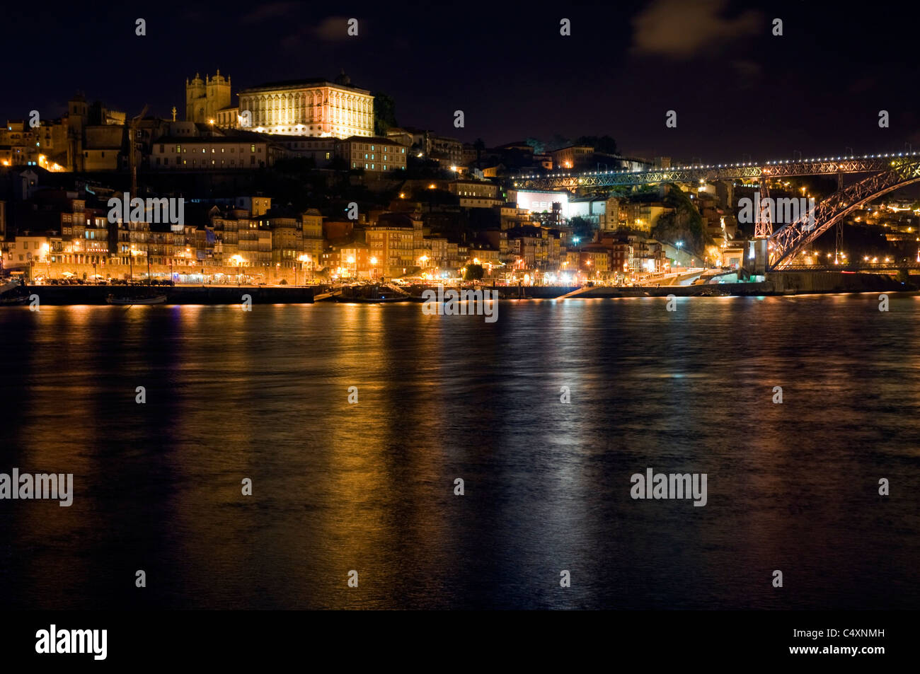 Night scene, Porto Portugal, with reflections in the river Douro Stock ...