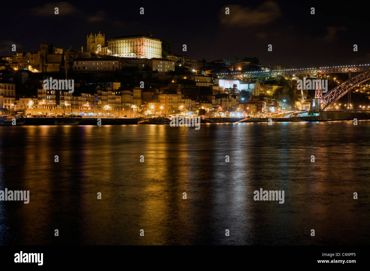 Night scene, Porto Portugal, with reflections in the river Douro Stock ...