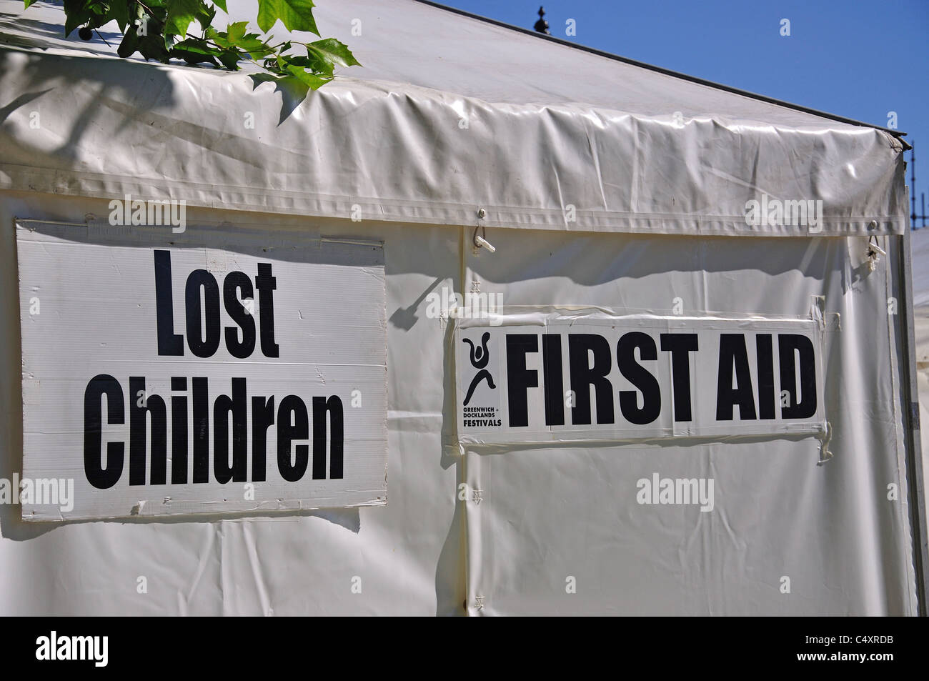 First aid and lost children signs on festival tent, Greenwich, Borough ...
