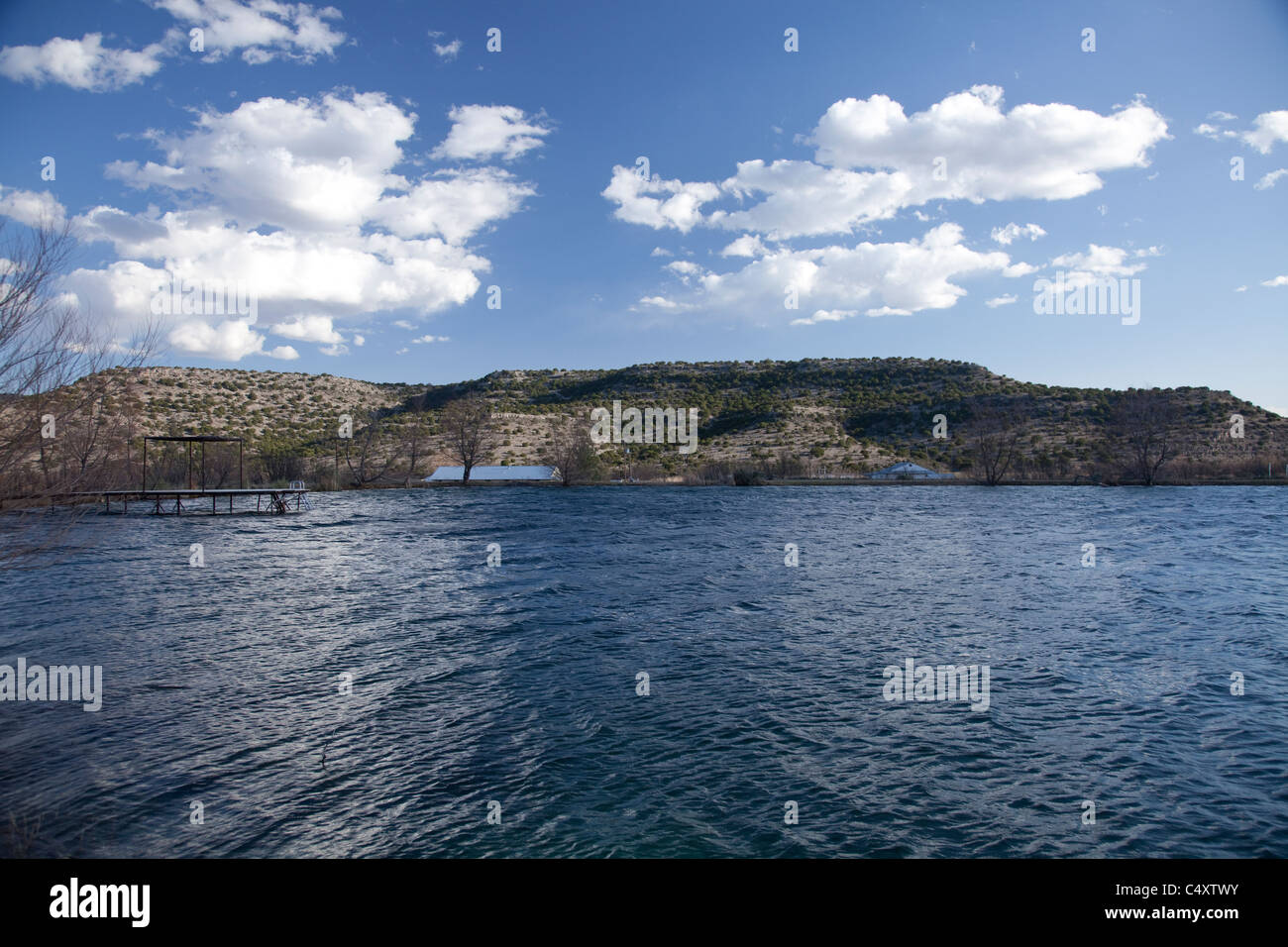 Breeze ruffles surface of clear spring-fed lake at Independence Creek ...