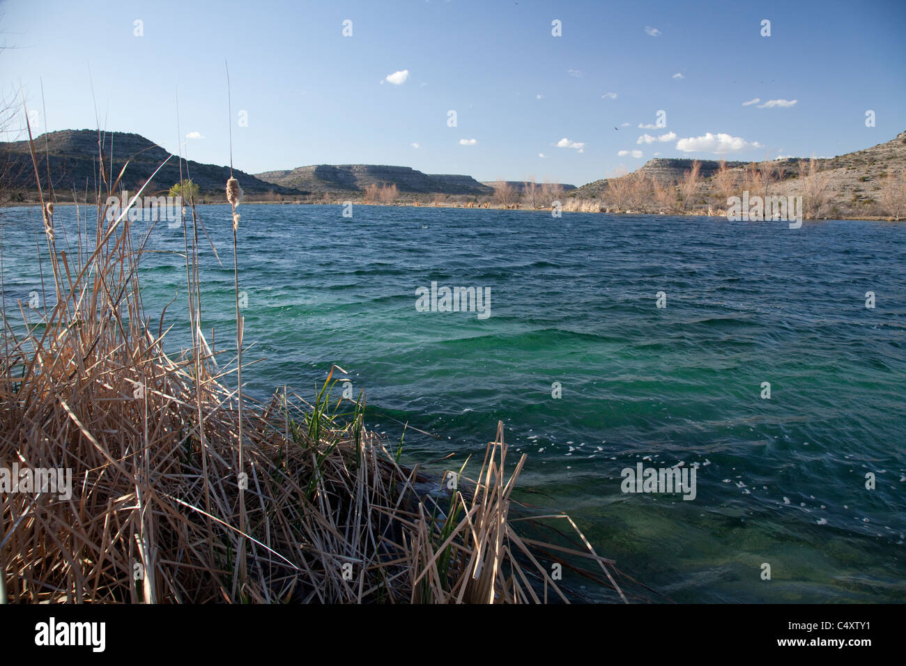 Breeze ruffles surface of clear spring-fed lake at Independence Creek ...