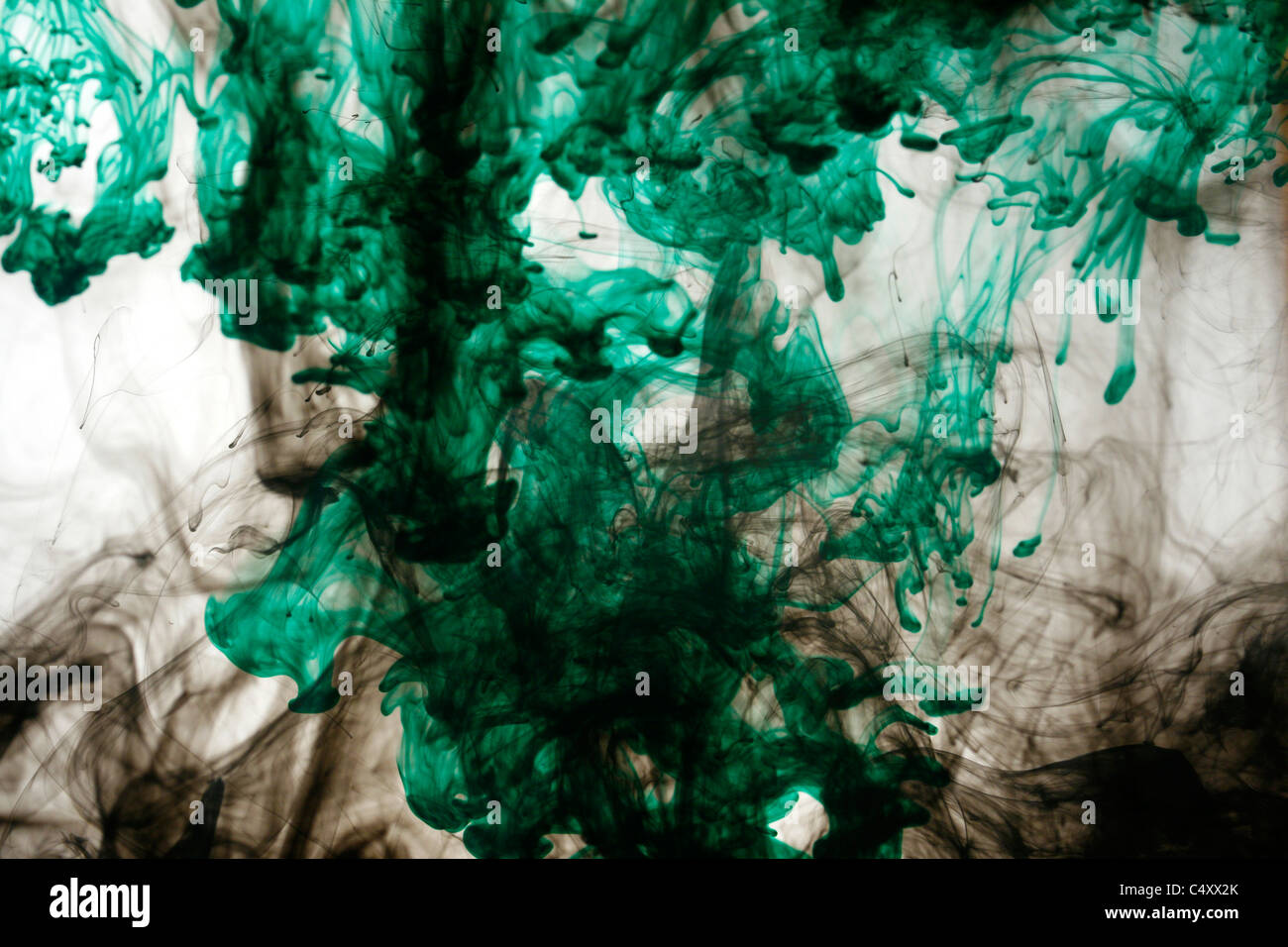 Smoke liquid ink in water Stock Photo - Alamy