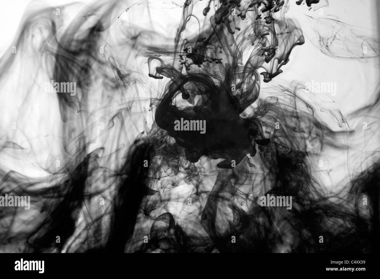 Smoke liquid ink in water Stock Photo - Alamy