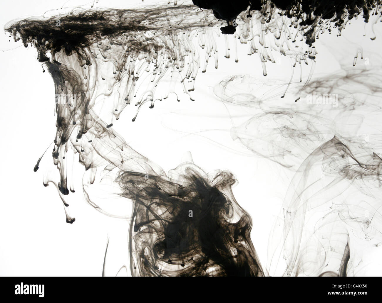 Smoke liquid ink in water Stock Photo - Alamy