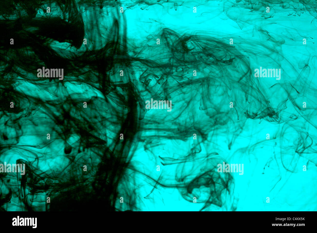 Smoke liquid ink in water Stock Photo - Alamy