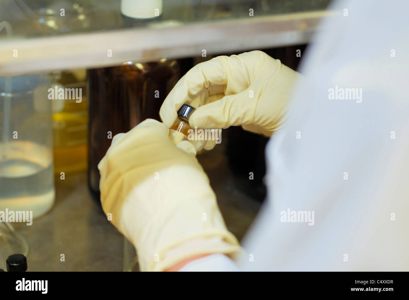 Female biologist working in the lab Stock Photo - Alamy
