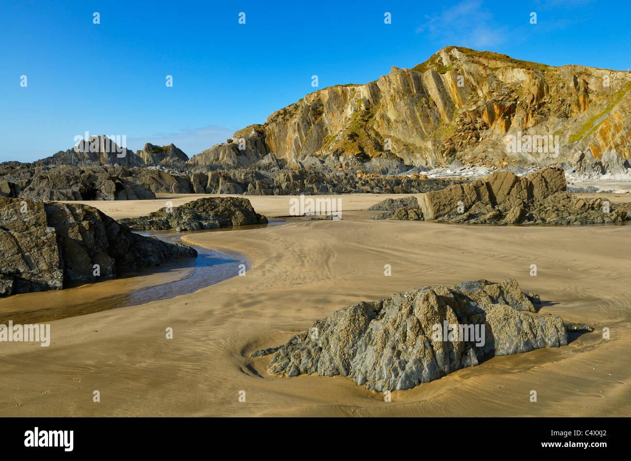 The beach and cliffs at Rockham Bay, Mortehoe, Devon, England Stock ...