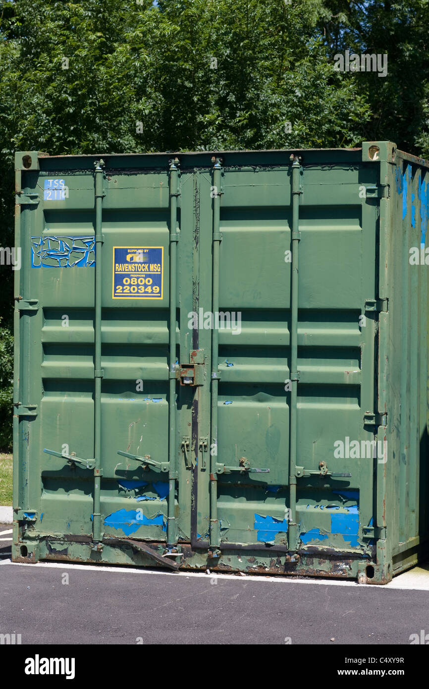 Metal storage container with peeling paint and Ravenstock branding ...