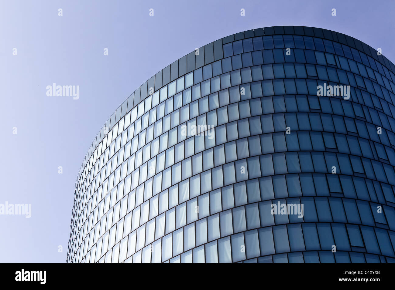 A modern glass facade with an almost irritating pattern Stock Photo - Alamy