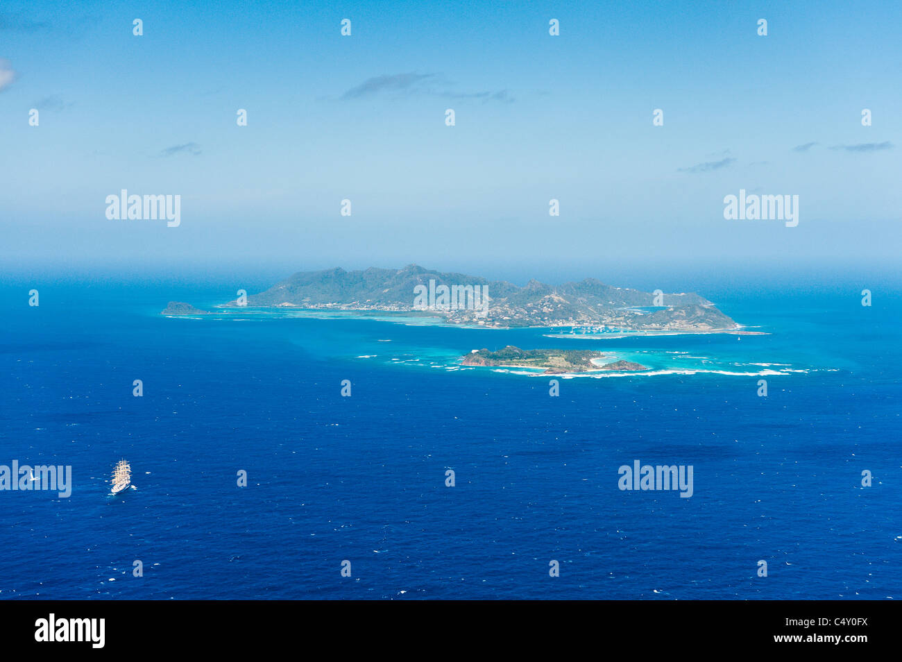 Aerial of Union Island (large) and Palm island, St. Vincent & The ...