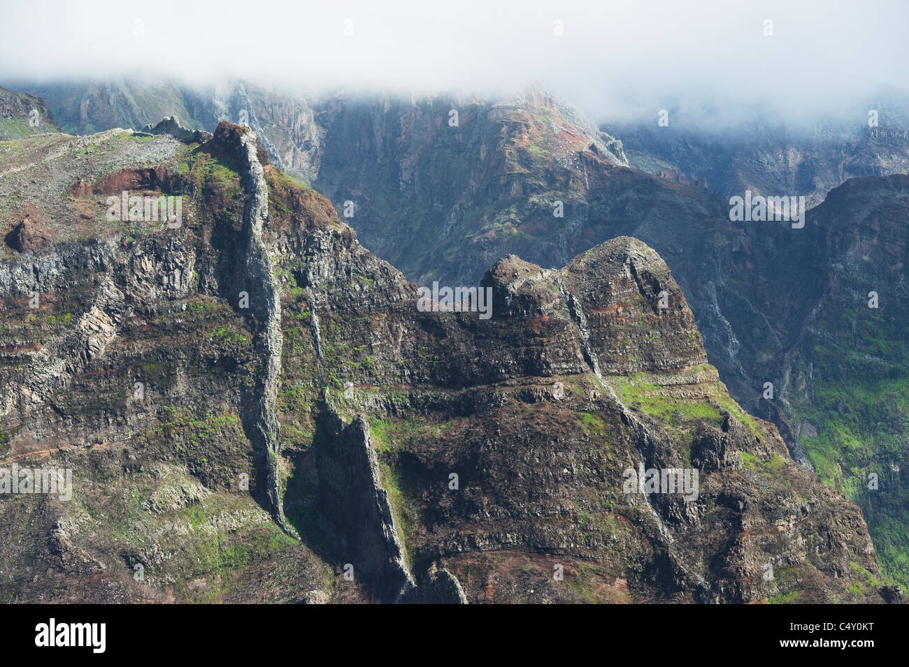 Volcanic Dikes in fog-shrouded mountains, Madeira Island, Portugal ...