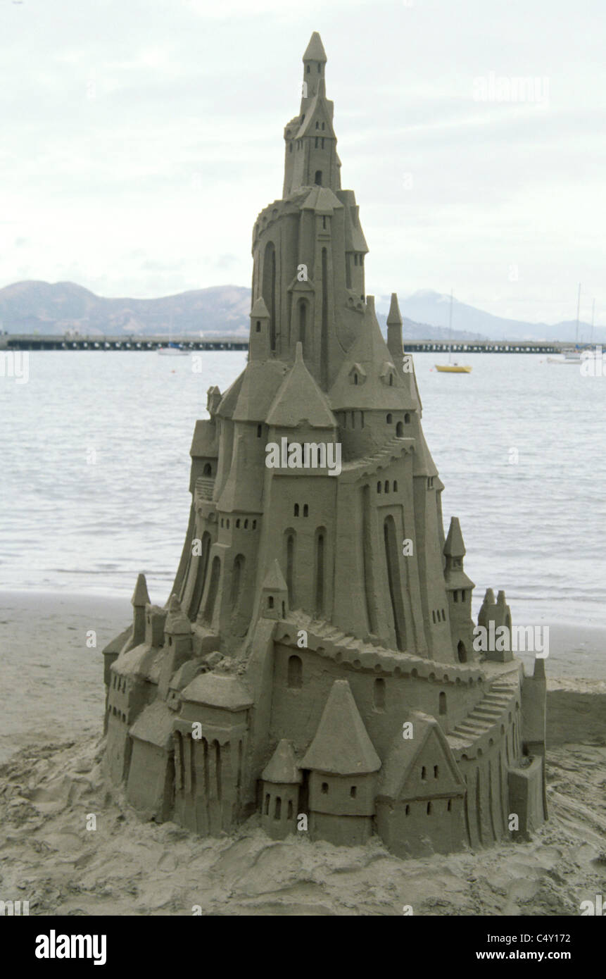 Sand castle built by architects in sand building contest sits on beach ...